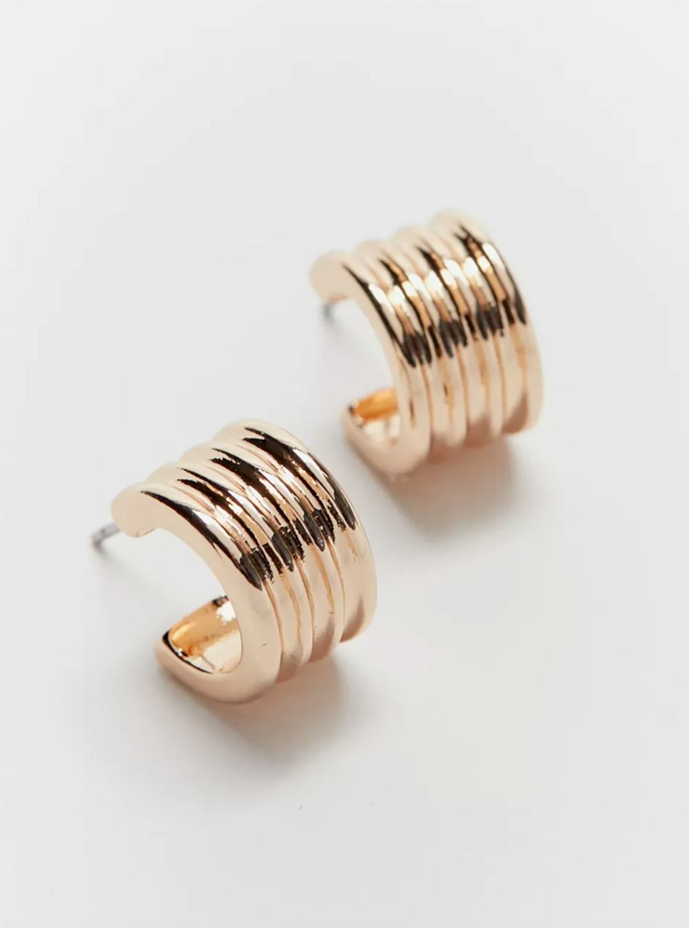 4 Hoop Earring Trends To Shop & Show Off