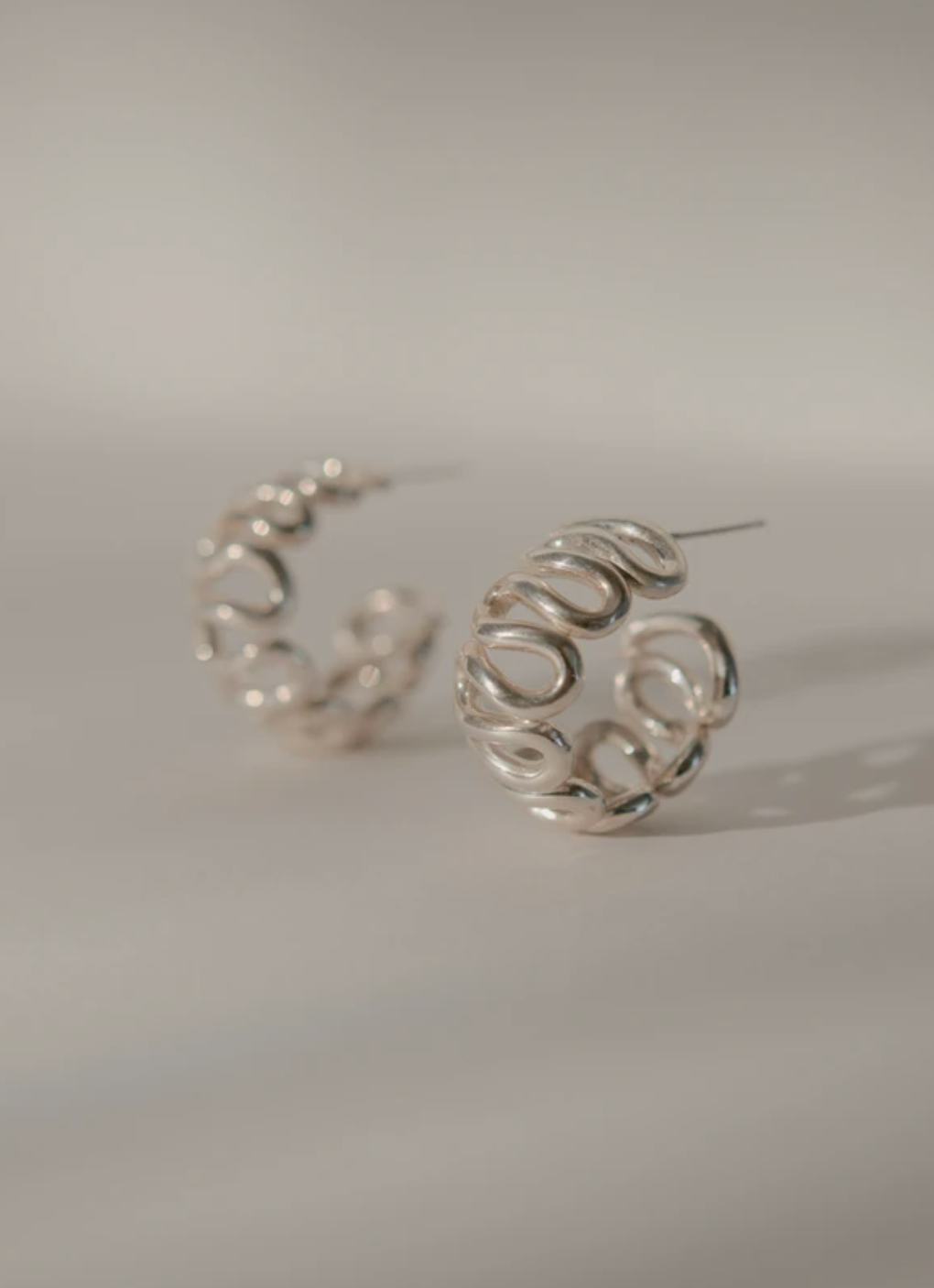 4 Hoop Earring Trends To Shop & Show Off