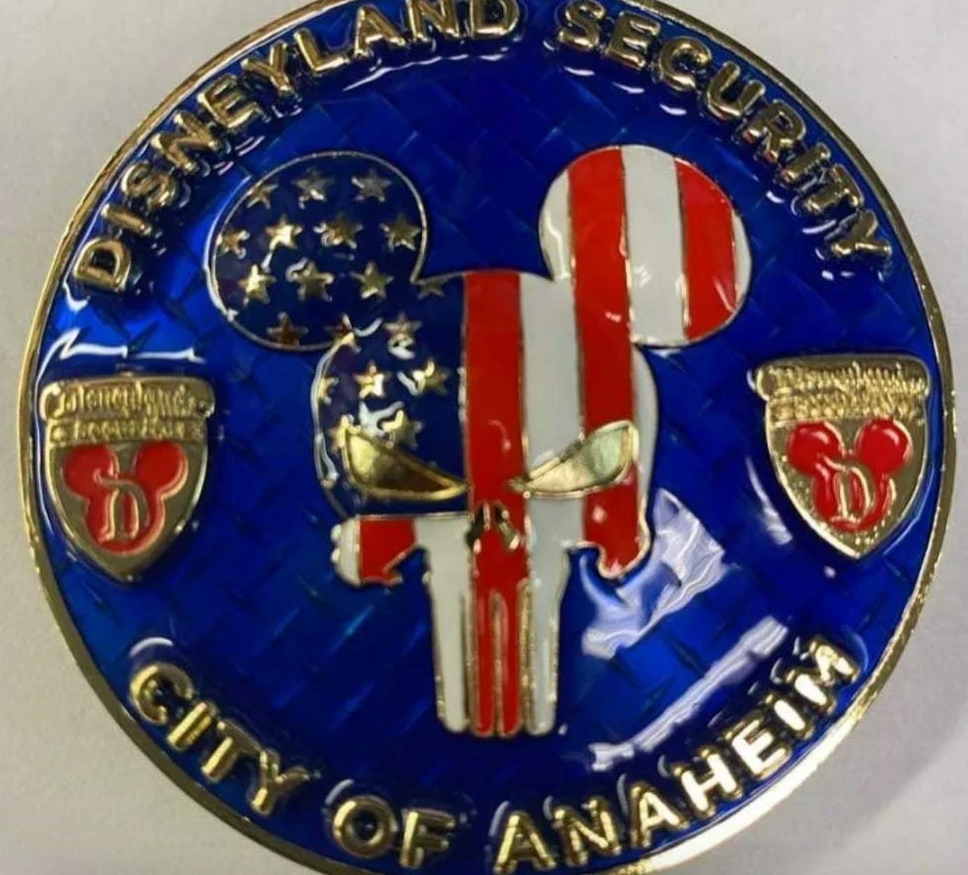 Disney security's Mickey x Punisher coin is the pinnacle of creepy cop ...