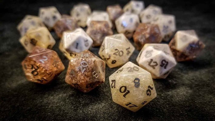 Roll the ultimate death save with these dice made from human bones
