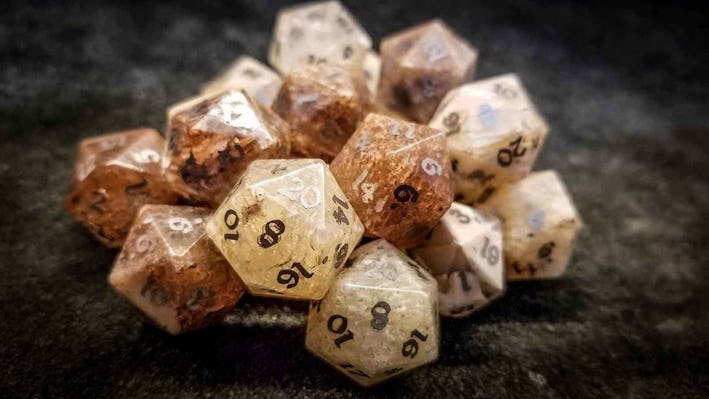 Roll the ultimate death save with these dice made from human bones