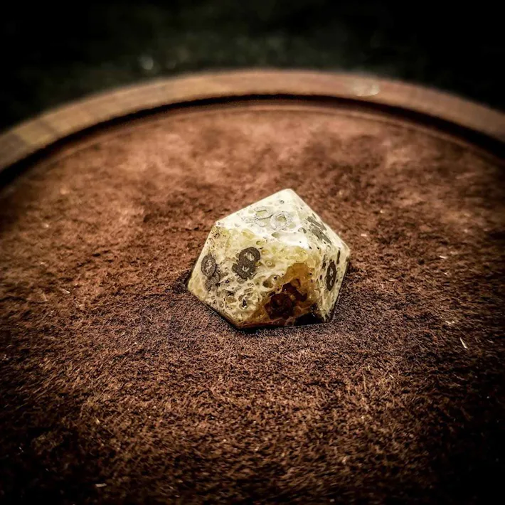 Roll the ultimate death save with these dice made from human bones