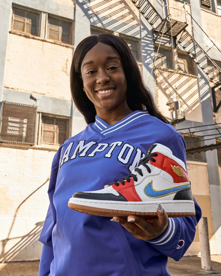 Homecoming and letterman jackets inspired this flashy Jordan 1 sneaker