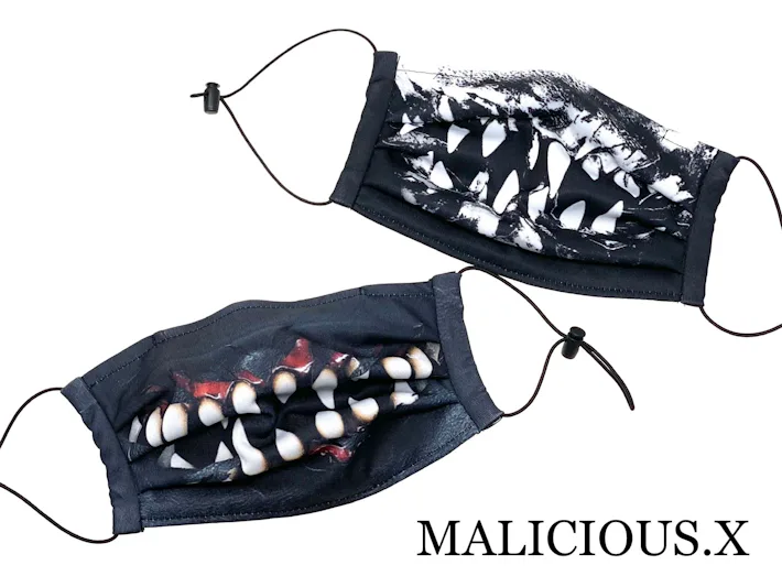 A Japanese fashion brand made face masks that look like horrific teeth ...