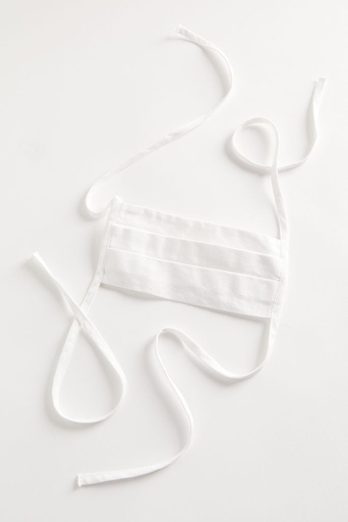 Meghan Markle Matched Her White Face Mask To Her Dress