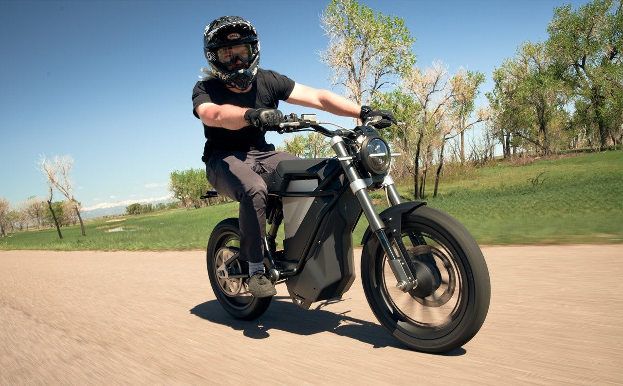 Land Energy's rugged e-motorcycle can swap batteries on the fly