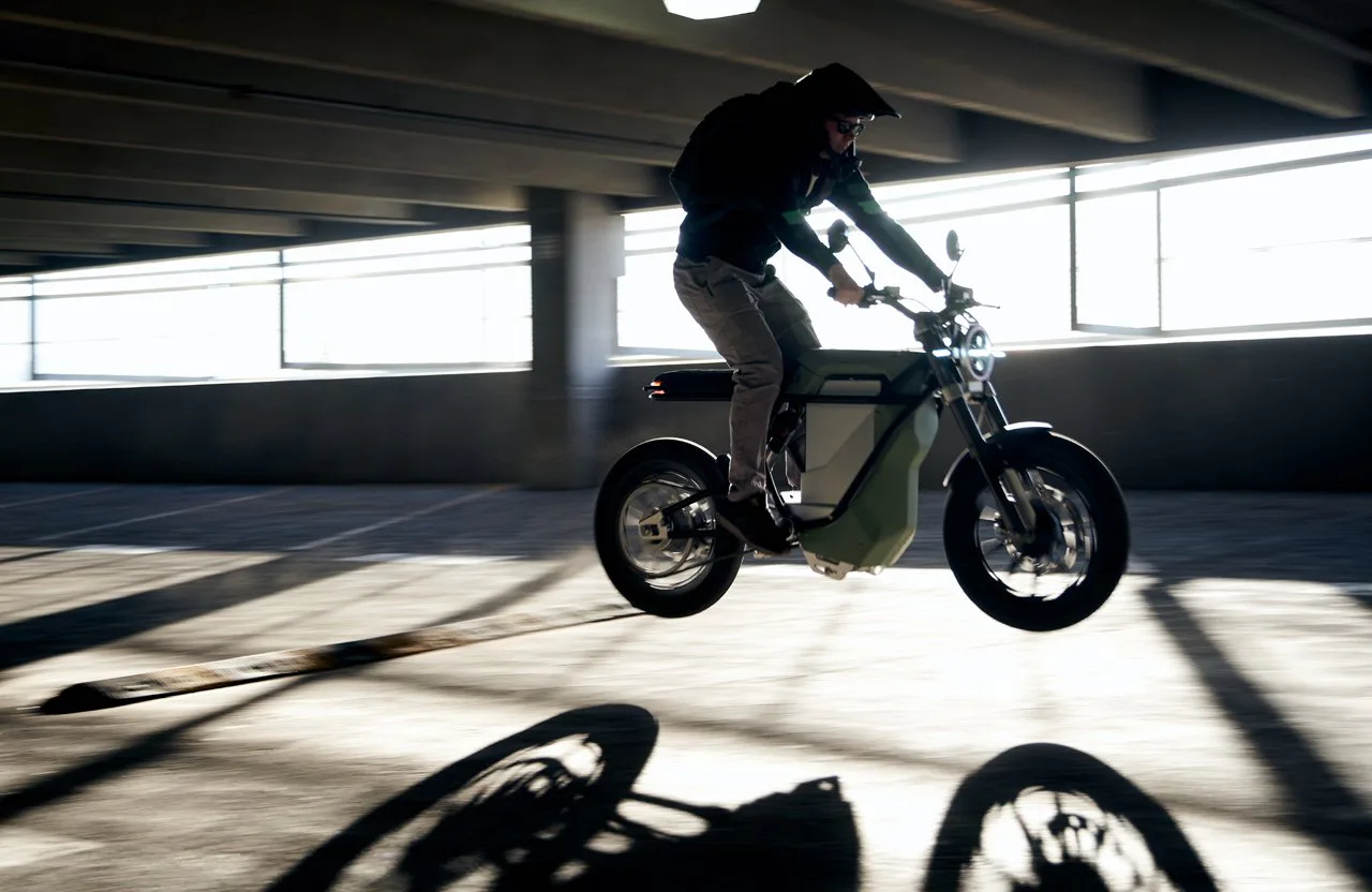 Land Energy's rugged e-motorcycle can swap batteries on the fly