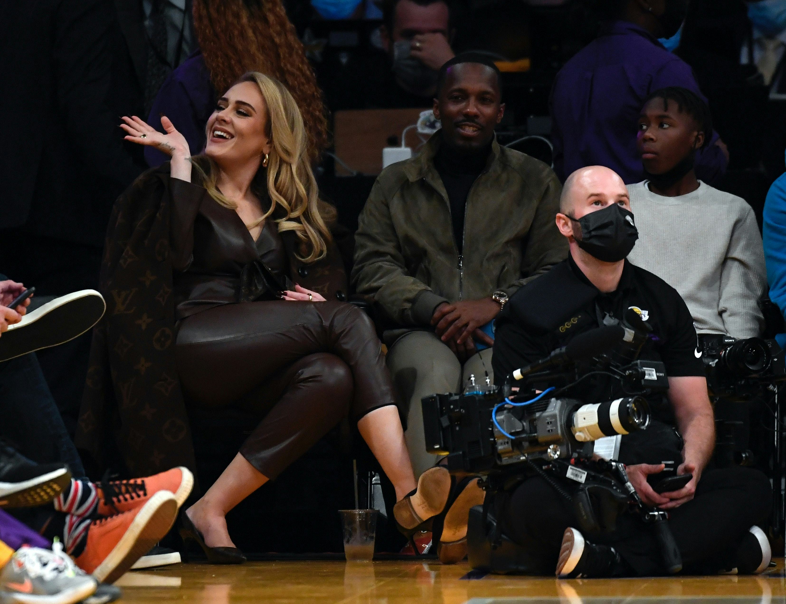 Adele Wore an All-Leather Jumpsuit and Louis Vuitton Coat Courtside