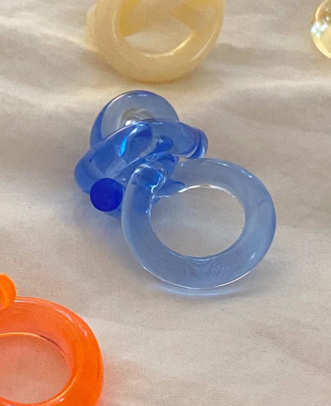 5 Fall Jewelry Trends To Shop Now, From Enamel To Zodiac Pieces