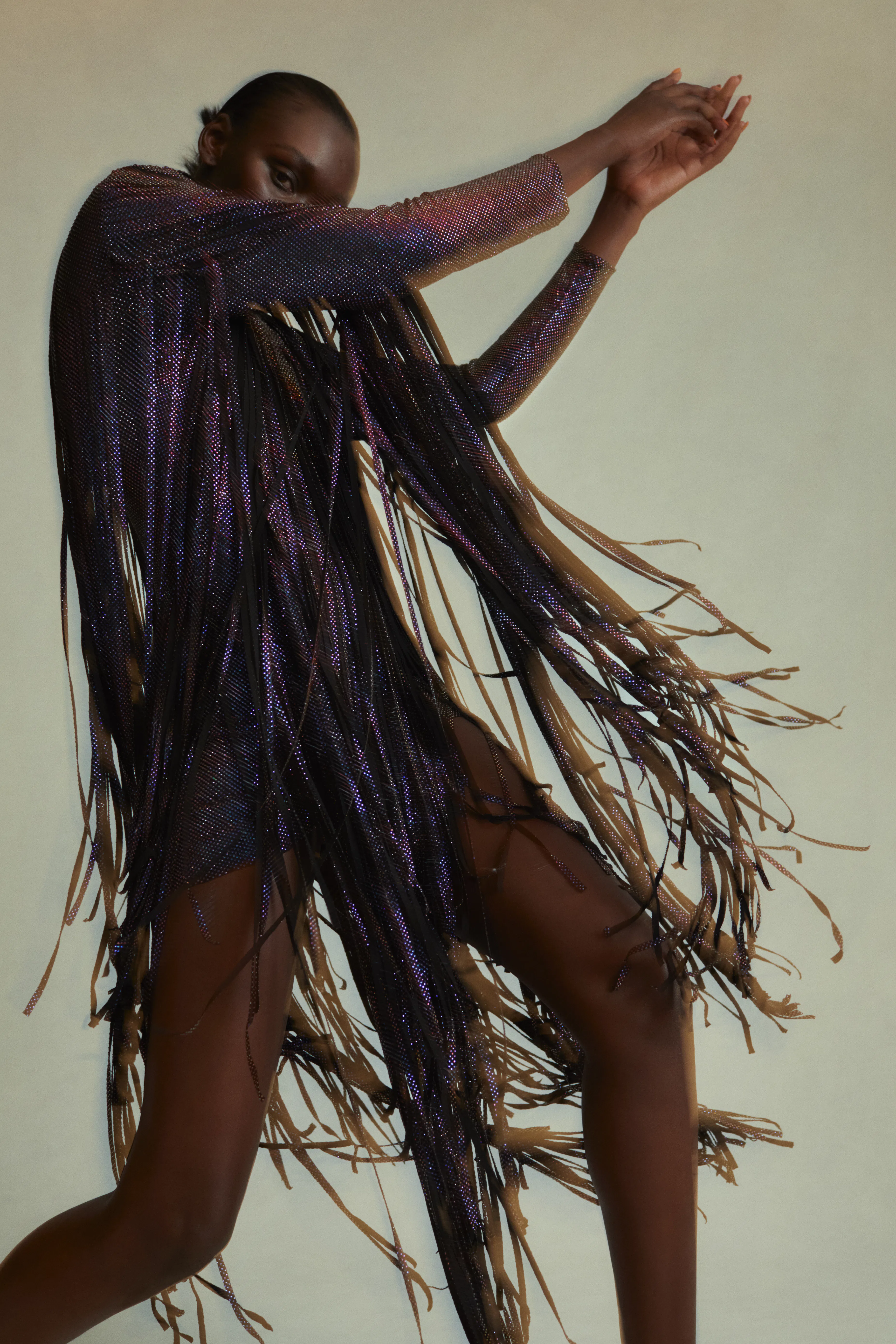 The Knit & Fringe Dress Are Two Of Winter 2021's Biggest Fashion Trends