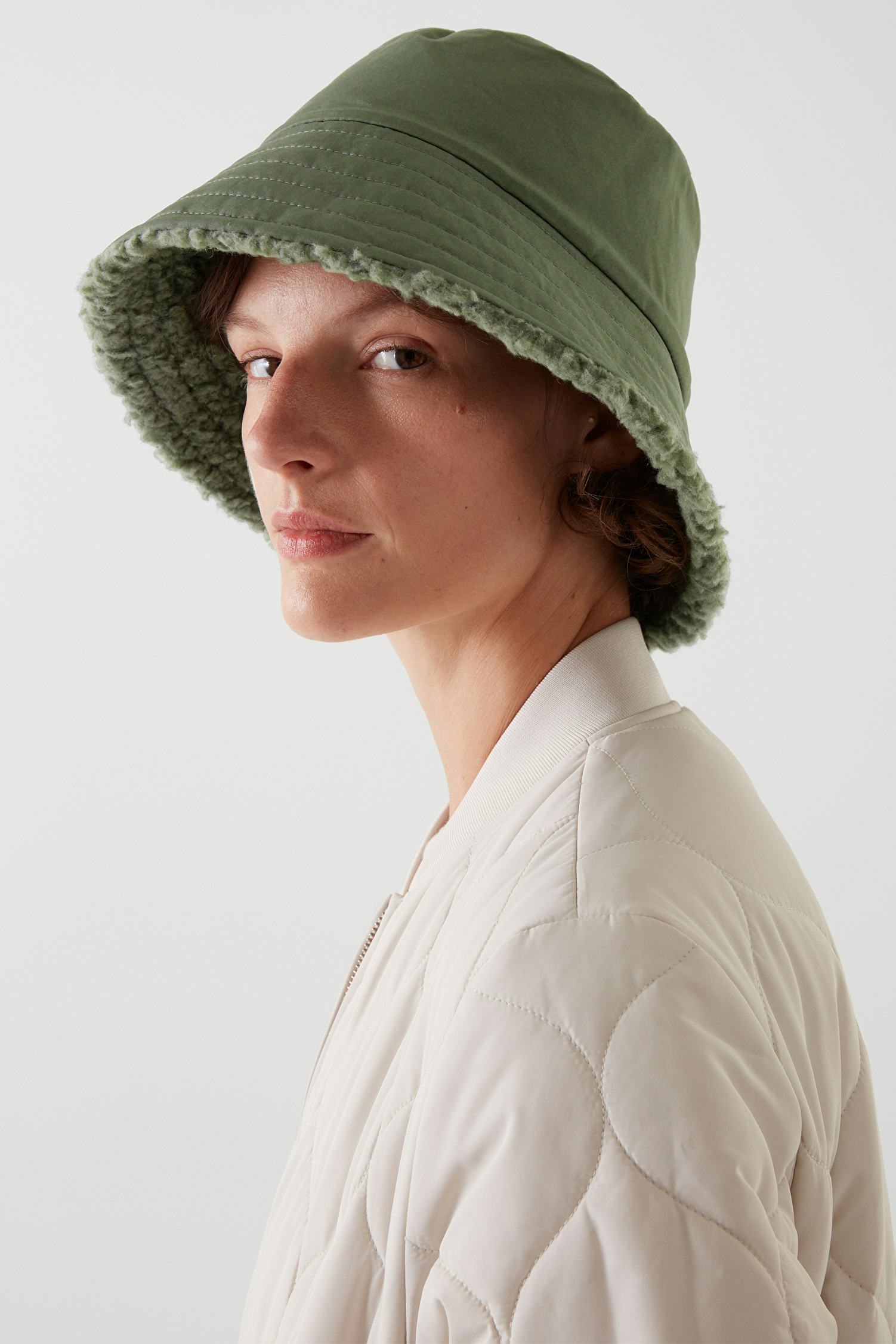 Shop Fuzzy Bucket Hats To Keep You Cozy & Warm This Winter 2022