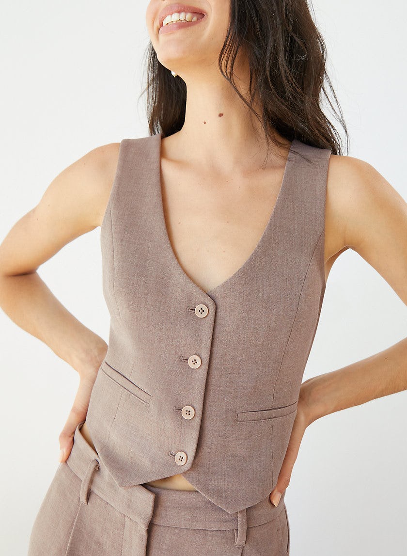 The Vest Trend Is Professional Yet Stylish — And Helpful For Summer Heat