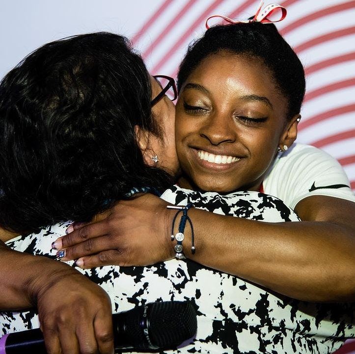 10 Photos Of Simone Biles With Her Parents & Siblings