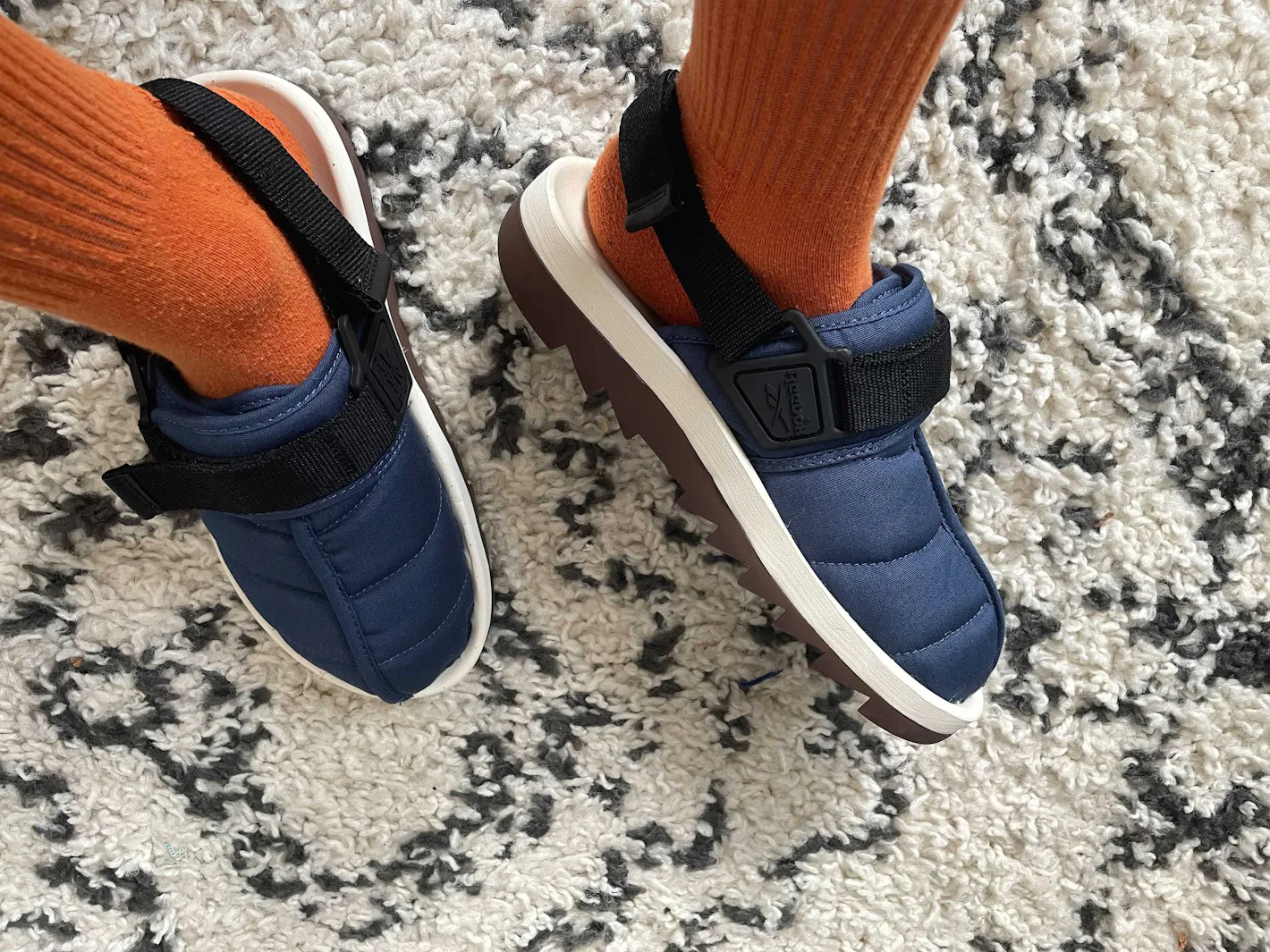 Wearing Reebok's Beatnik Sandal: A flashy mule shoe that belongs at home