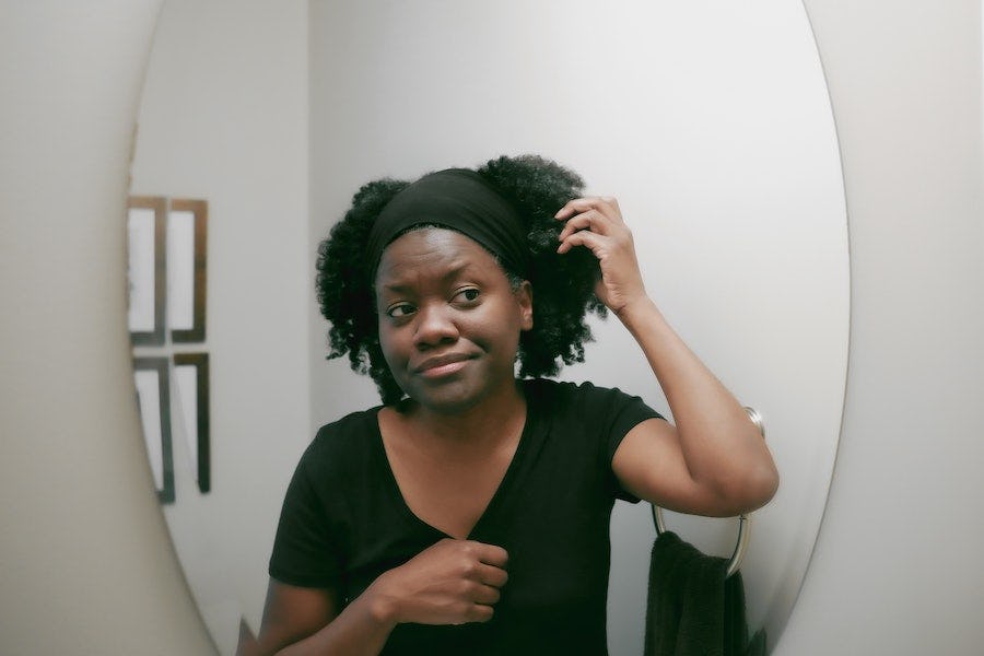 Letting Hair Air Dry Has Pros & Cons — Here's What To Know