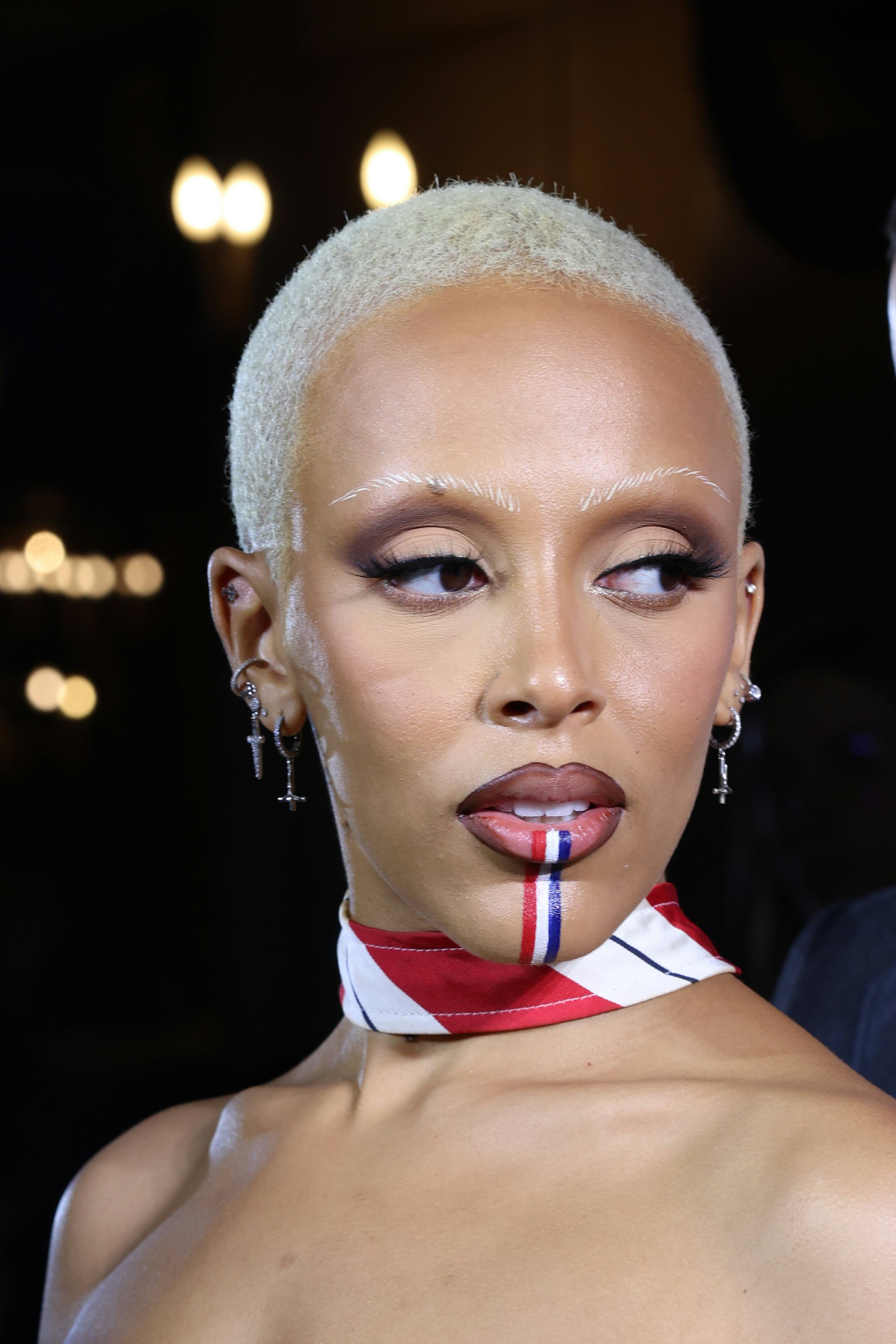 Doja Cat Painted Herself Gold For a Paris Fashion Week Appearance