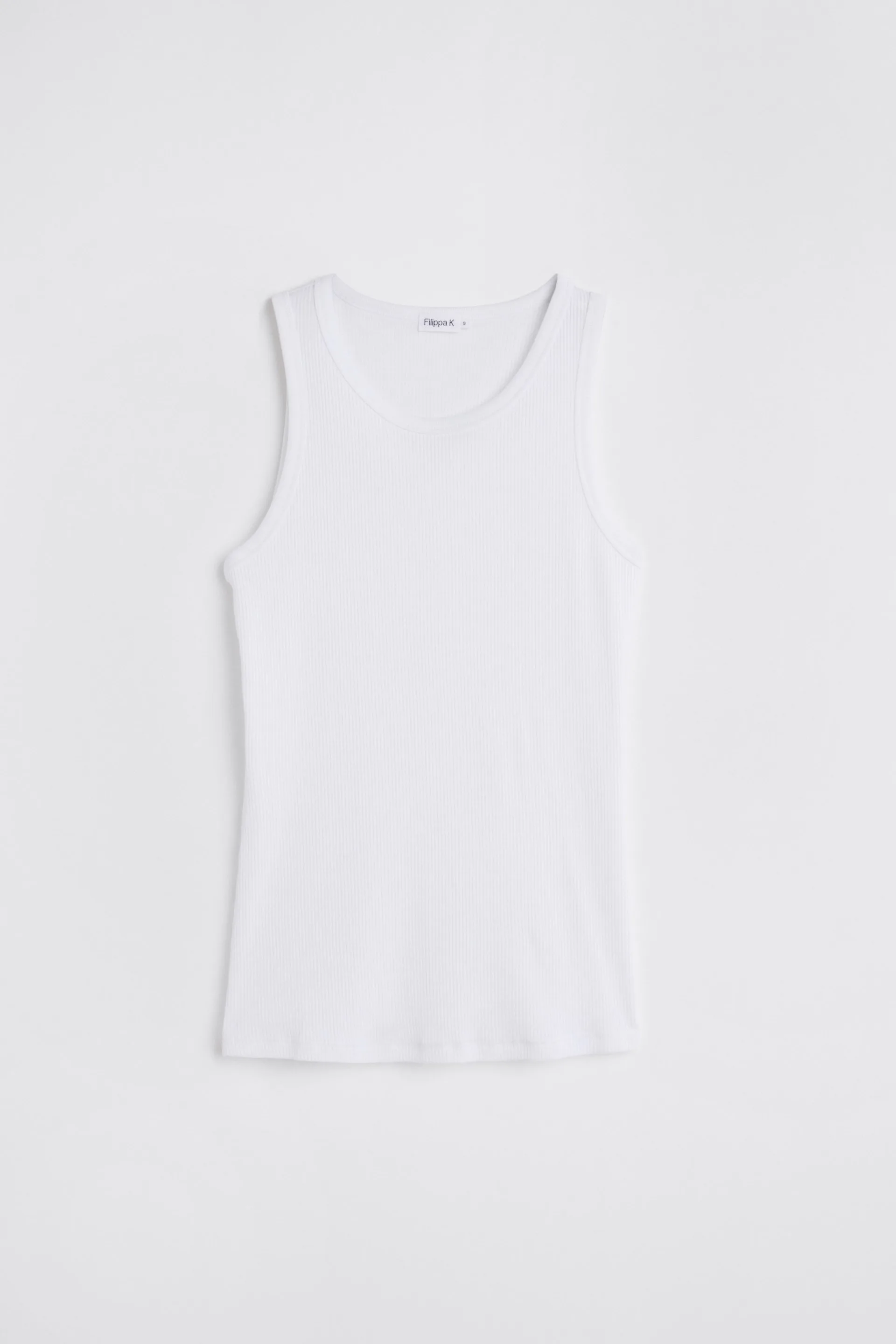 Bella Hadid’s White Tank Is Her Trusty Everyday Staple