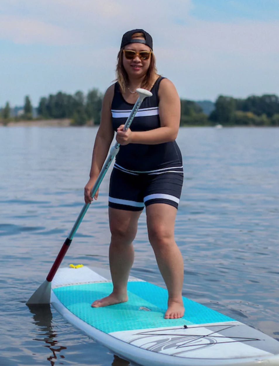 9 Best Gender-Affirming Trans Swimwear, According To Reviewers