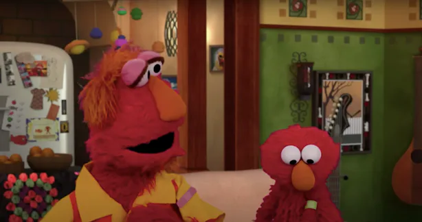 Elmo Talks About Getting His Covid Vaccine With Dad Louie In PSA