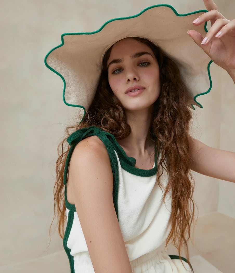 Summer 2022's Hat Trends Are Equal Parts Practical & Chic