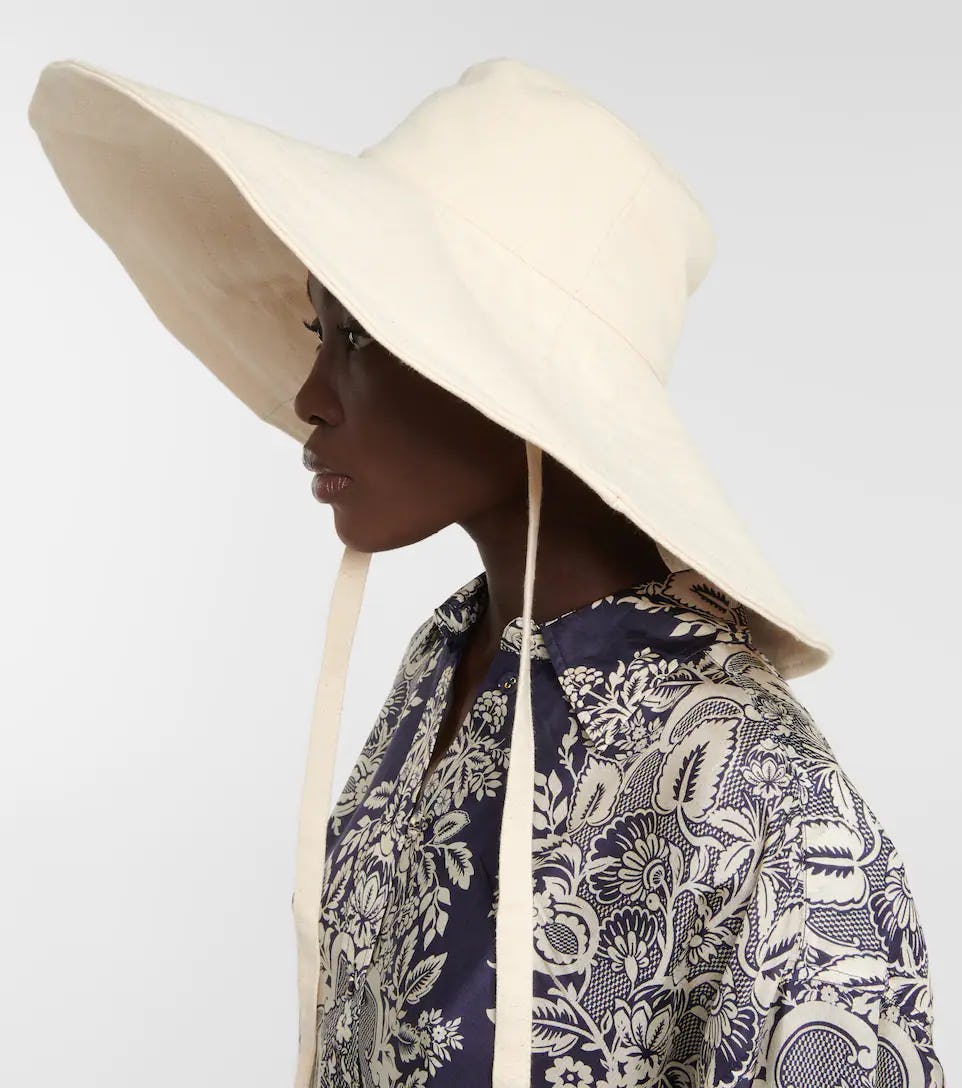 Summer 2022's Hat Trends Are Equal Parts Practical & Chic