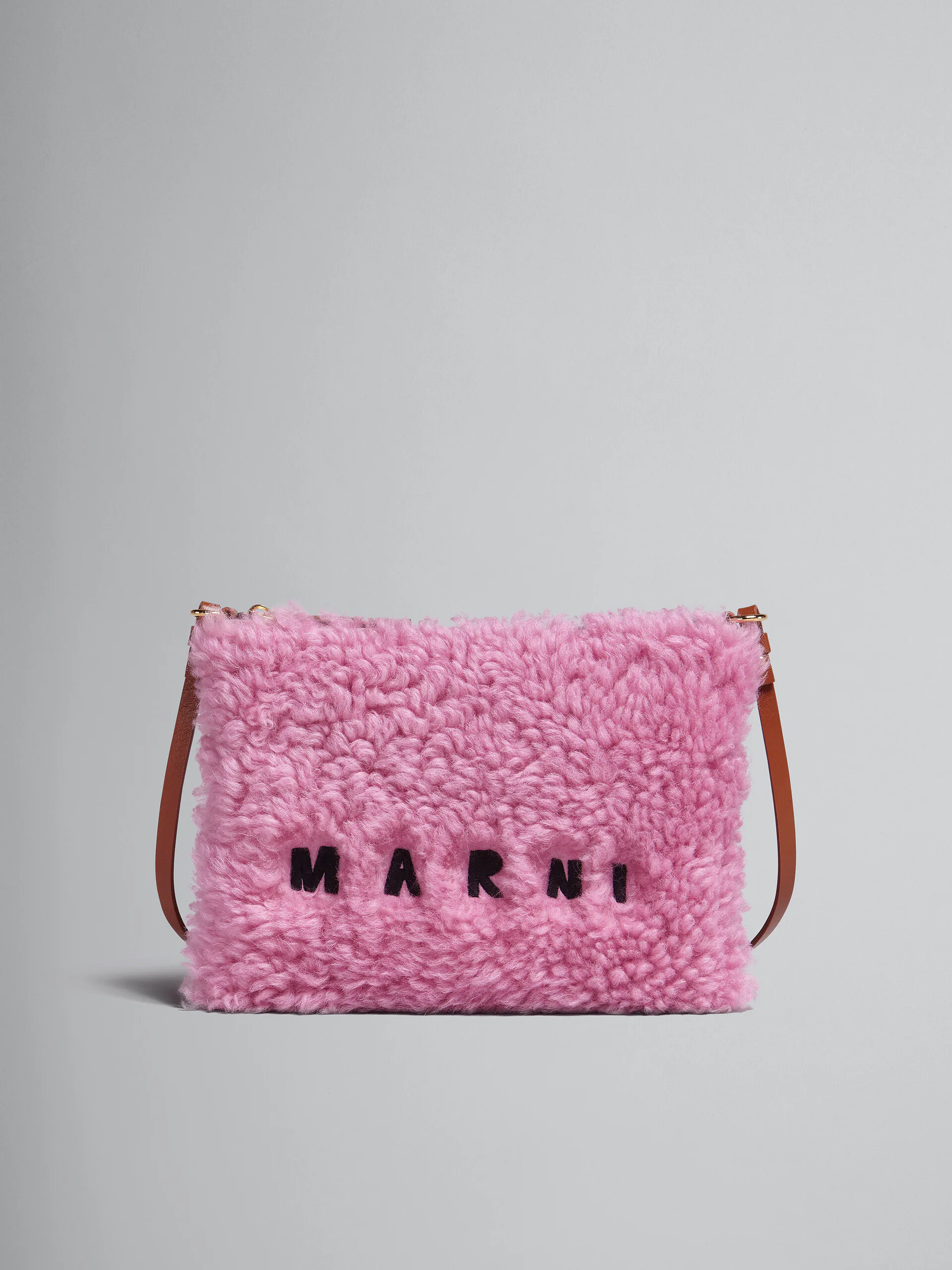 Lori Harvey’s Furry Bag Is The Statement Accessory You Need For Fall