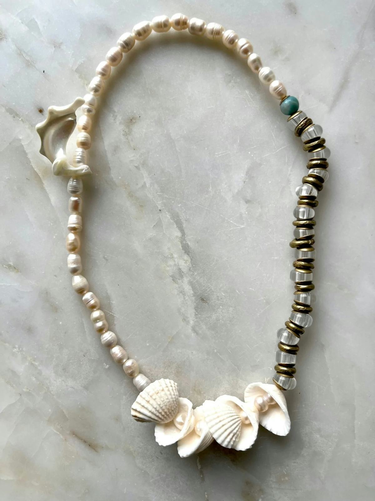 15 Chic Shell Necklaces To Shop For That 2000s Cool-Girl Vibe