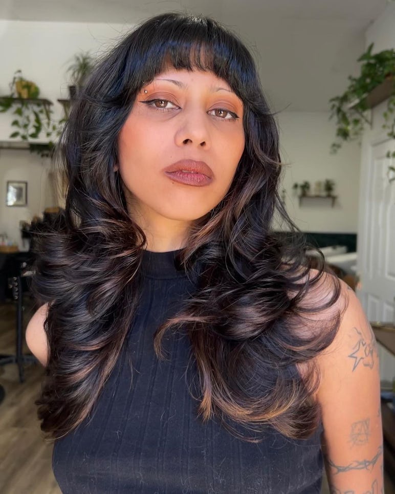 A Complete Wolf Cut Guide For Curly Hair, Straight From Pro Stylists