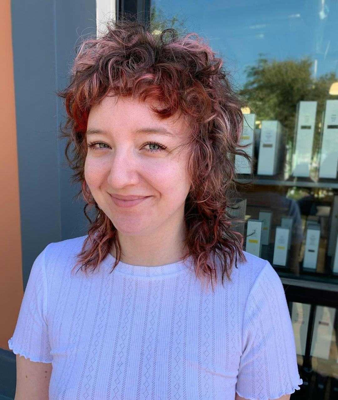 A Complete Wolf Cut Guide For Curly Hair, Straight From Pro Stylists