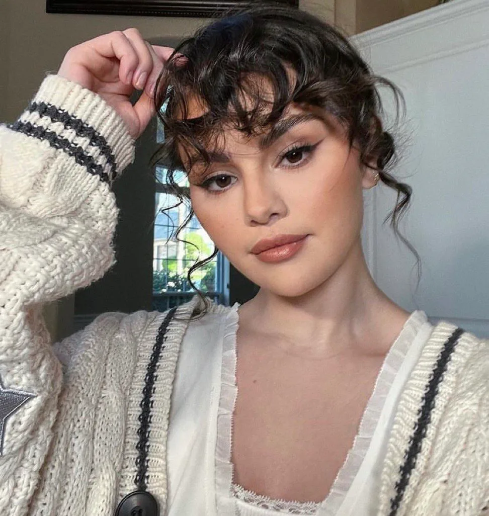 Selena Gomez's Braided Buns At Taylor Swift's Concert Scream 'Folklore' Era