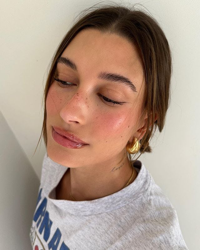 Hailey Bieber's 'Strawberry Girl' Makeup Tutorial Has The Best Blush Hack
