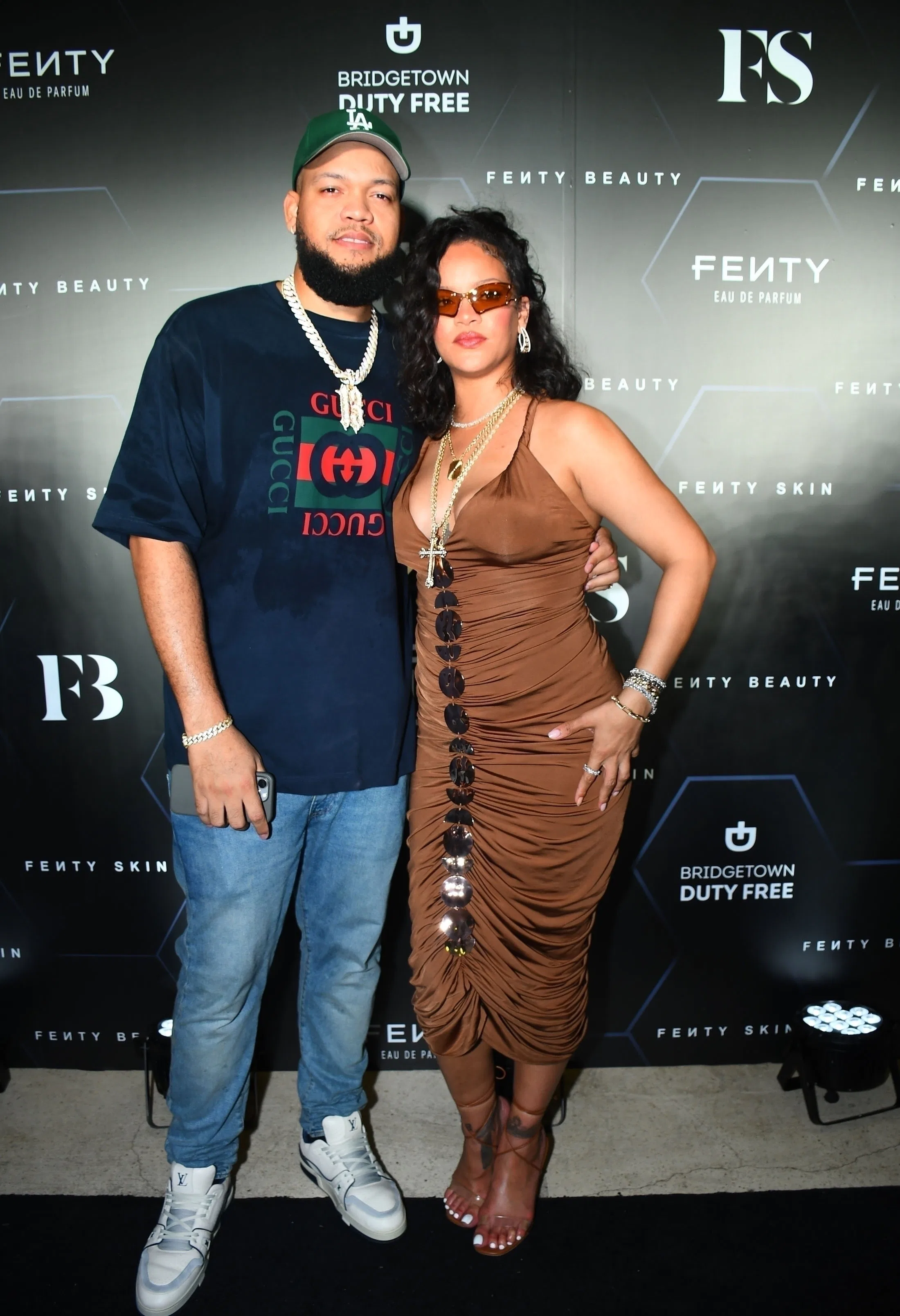 Rihanna Embraces Island Style In a Sheer Mermaid Dress With Major Sleeves