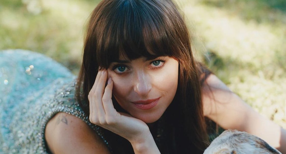 Dakota Johnson Wore A Dangerously Low-Cut Dress On 'Bustle' Cover