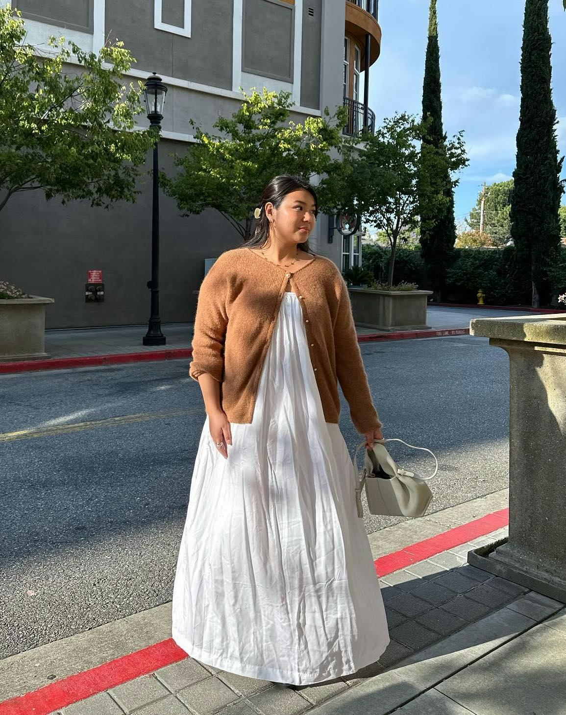 These 10 Light Sweaters Are Perfect For Unpredictable Spring Weather