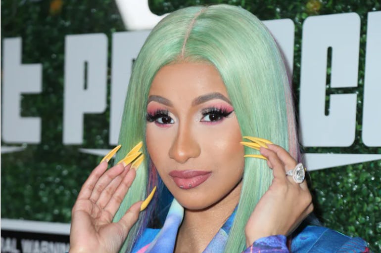 Cardi B Wore Neon Fishnets & Pasties On Rolling Stone's Cover