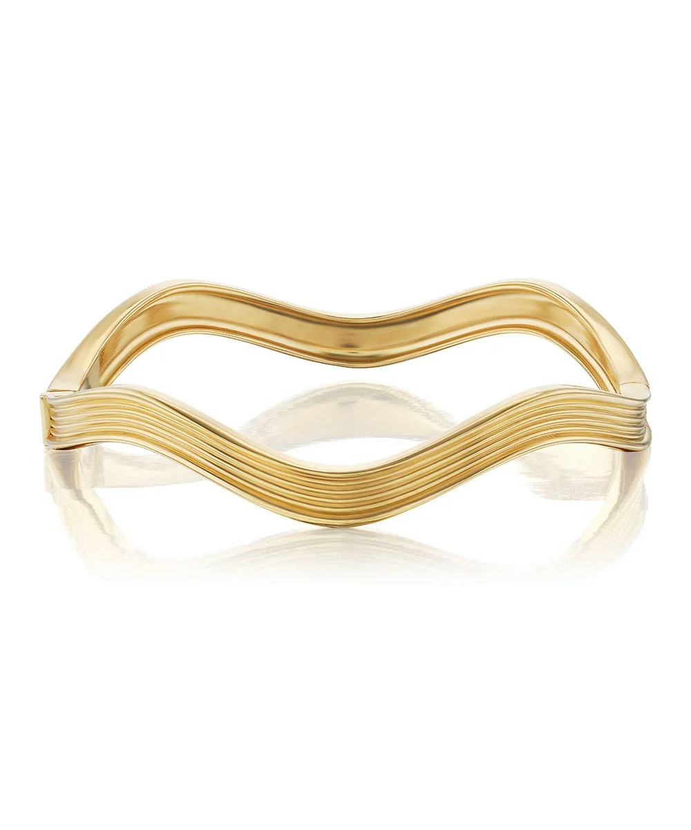 How To Mix Gold & Silver Jewelry, According To The Pros