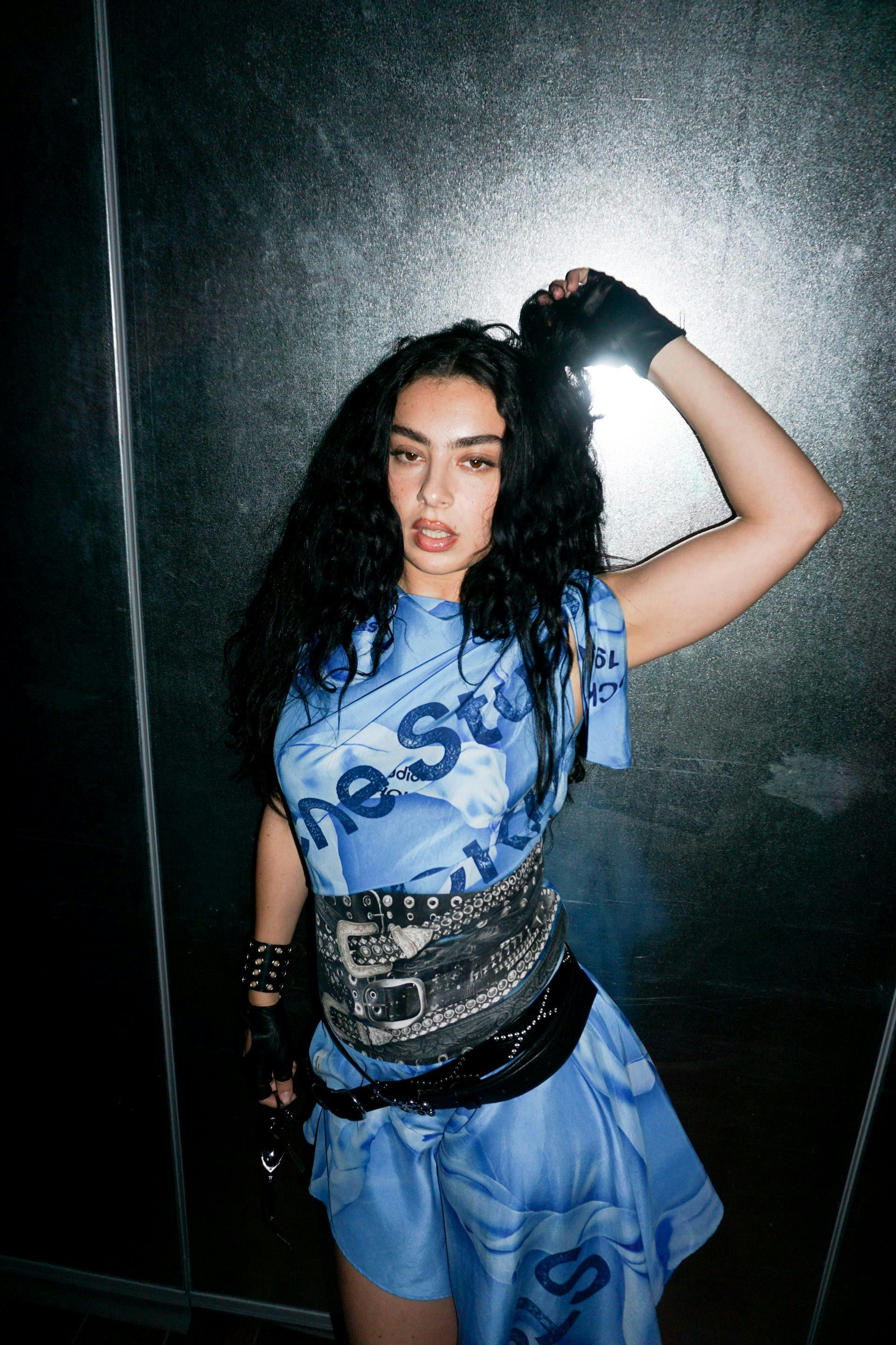 Charli XCX Frees the Nipple In a Nude Lingerie Dress For "Sweat" Tour