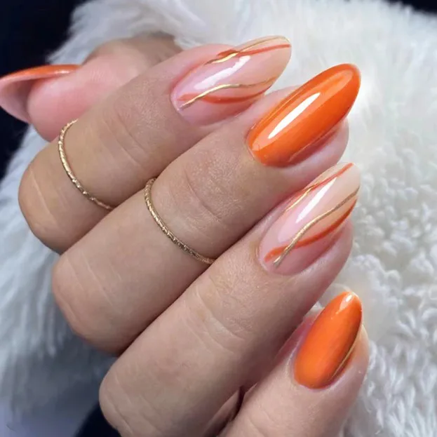 16 Orange Cat-Eye Nail Ideas With Taylor Swift 'Showgirl' Energy