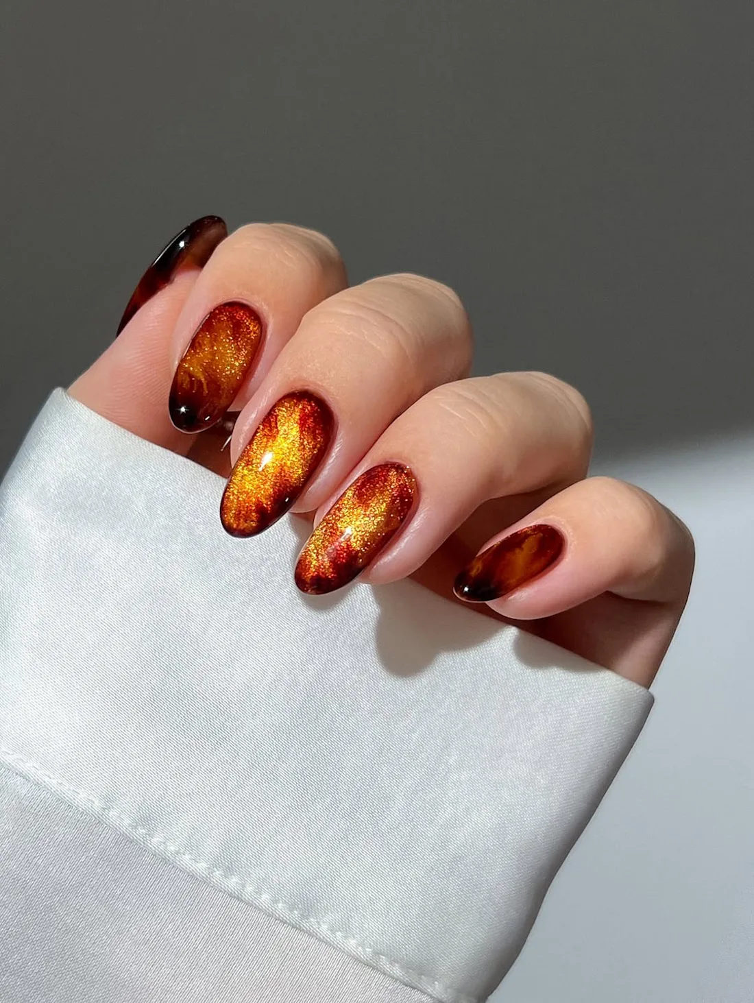 16 Orange Cat-Eye Nail Ideas With Taylor Swift 'Showgirl' Energy
