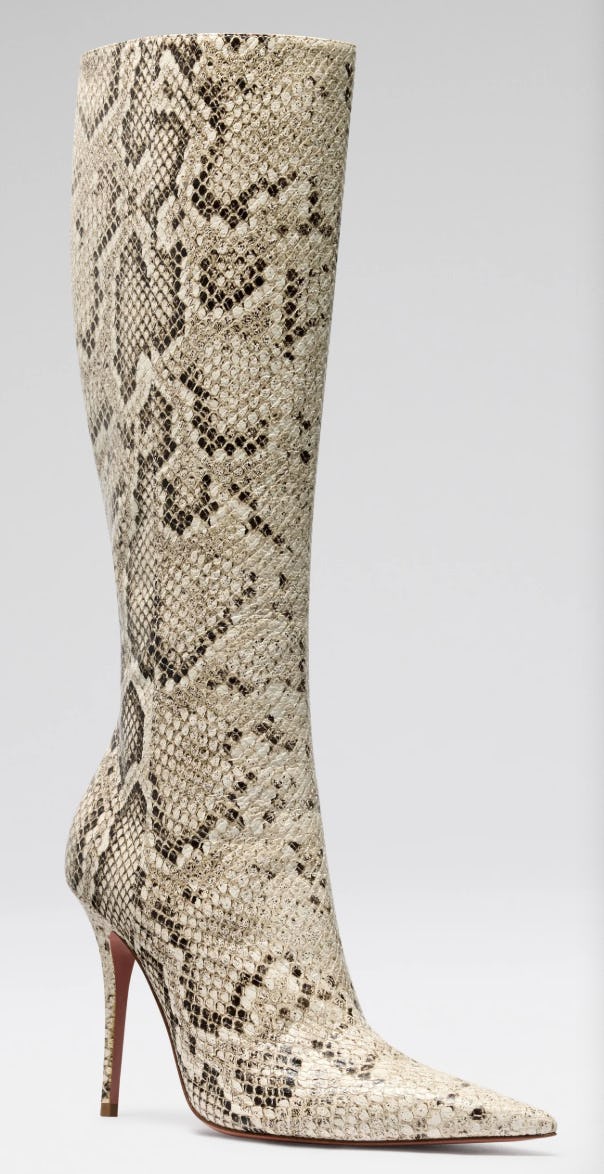 Rihanna’s Green Leather Trench Looked Luxe Alongside Snakeskin Boots