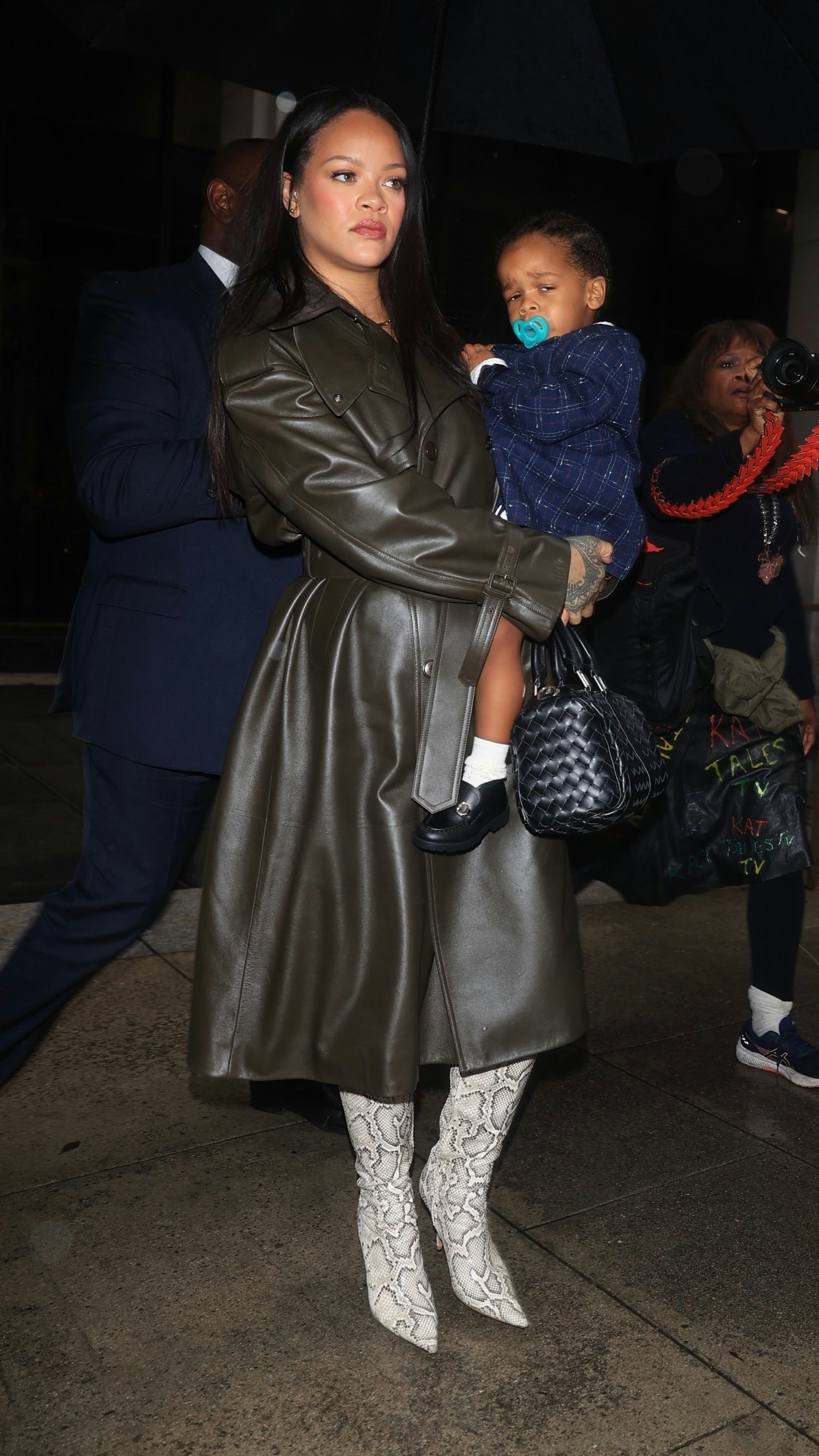 Rihanna’s Green Leather Trench Looked Luxe Alongside Snakeskin Boots