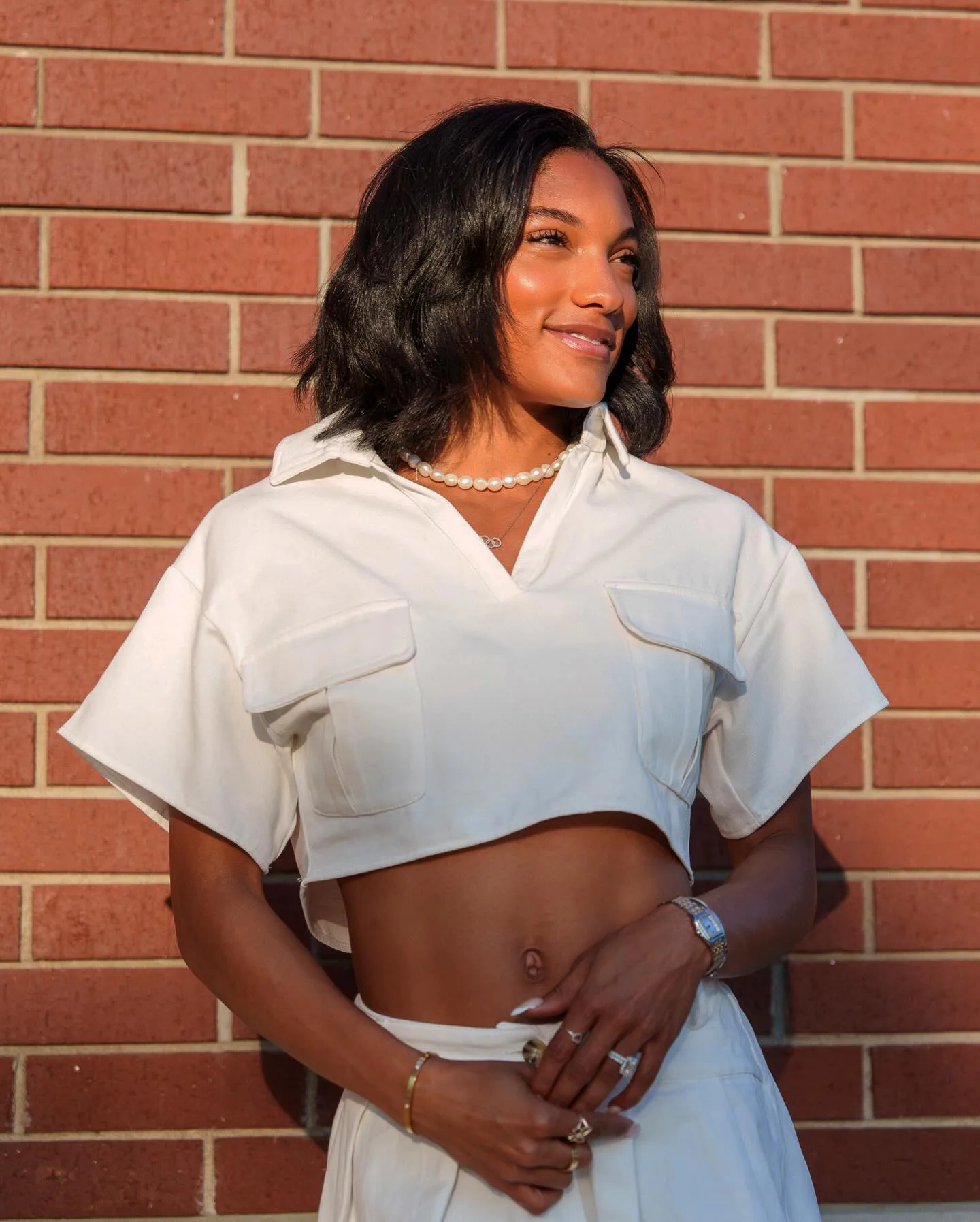 Tara Davis-Woodhall & Dove Want Natural Hair Representation In Emojis
