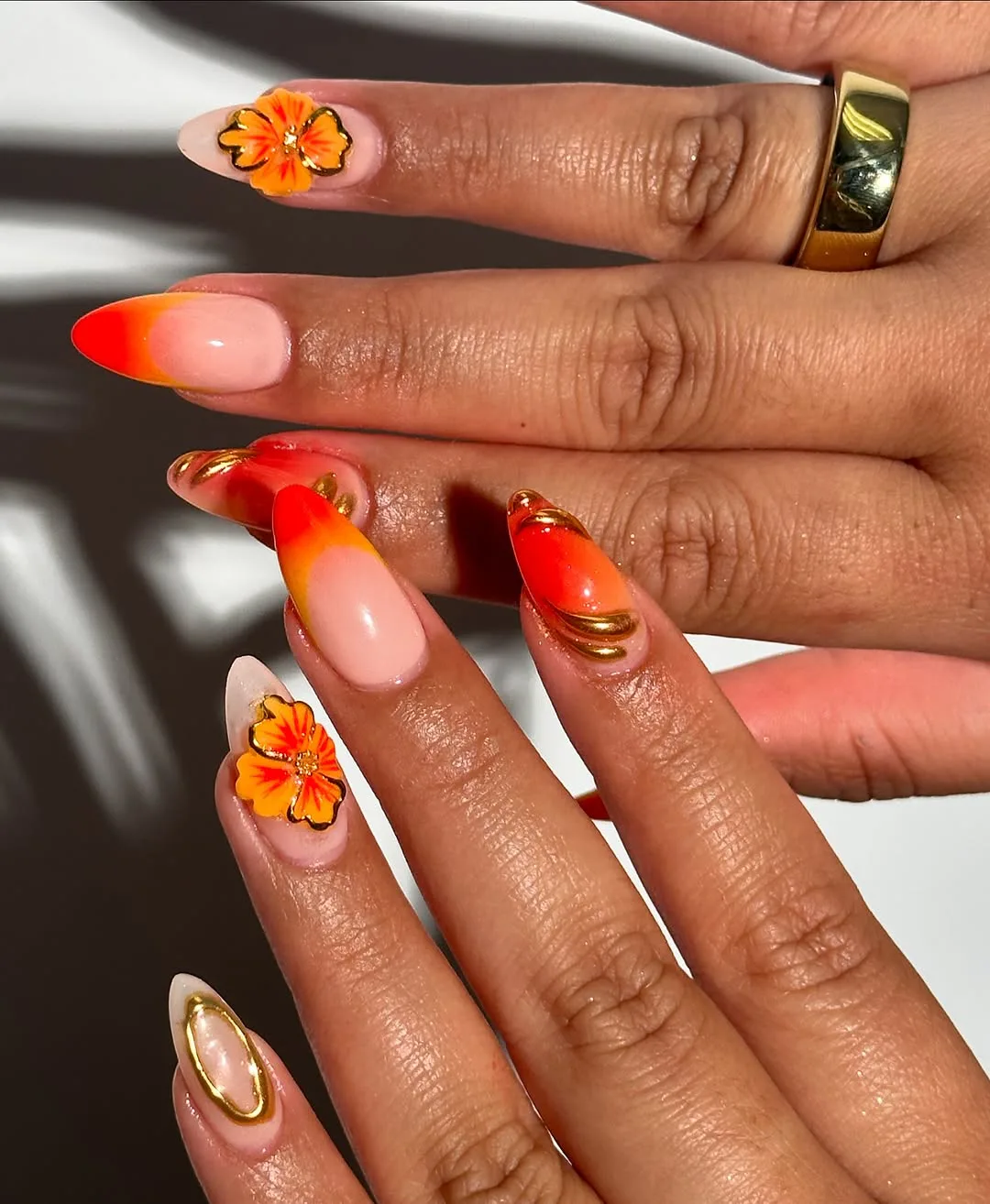 The "Sunset Nail" Trend Brings Golden Hour To Your Fingertips