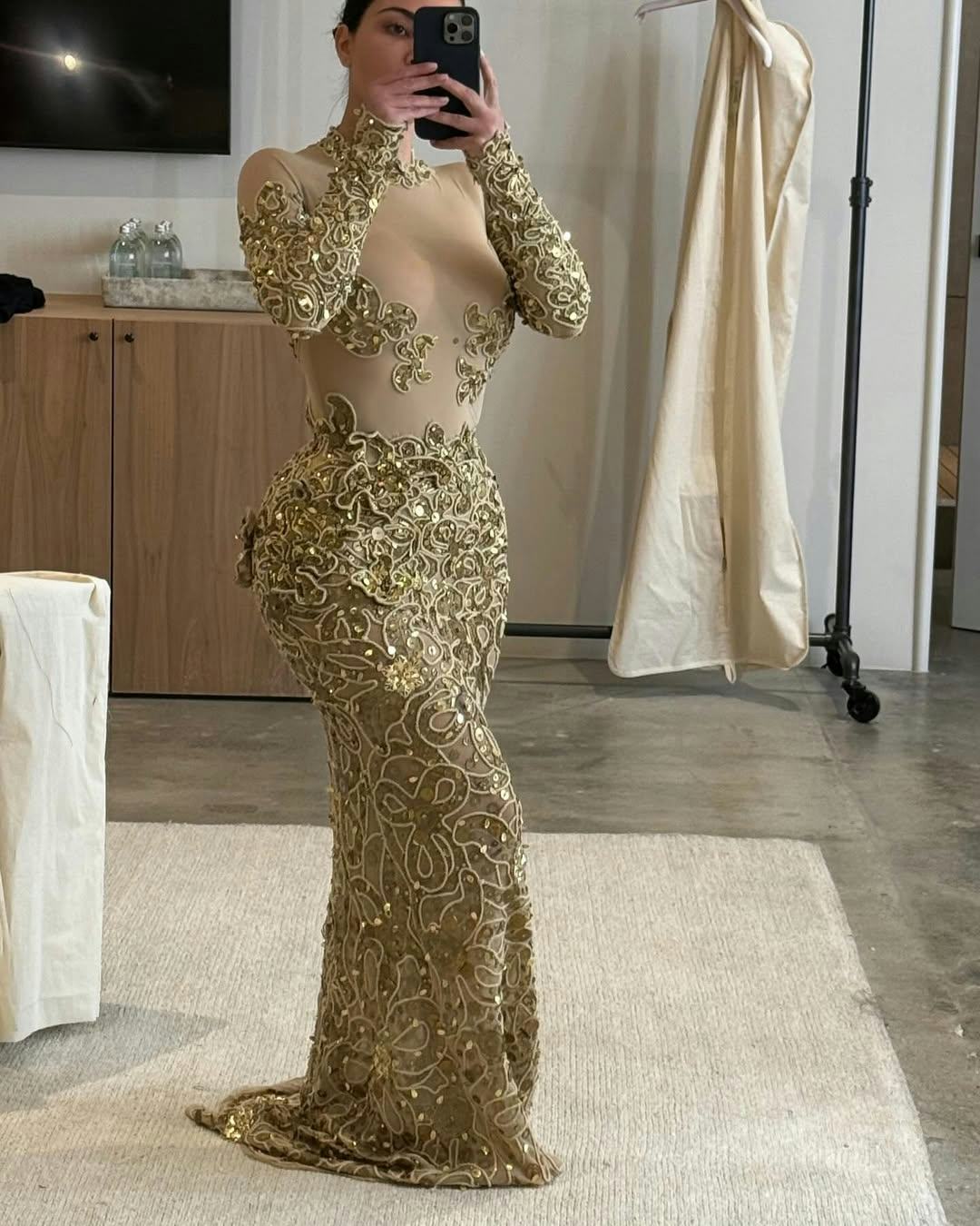 Kim Kardashian's White Sheer Skirt Showed Off Her Thong