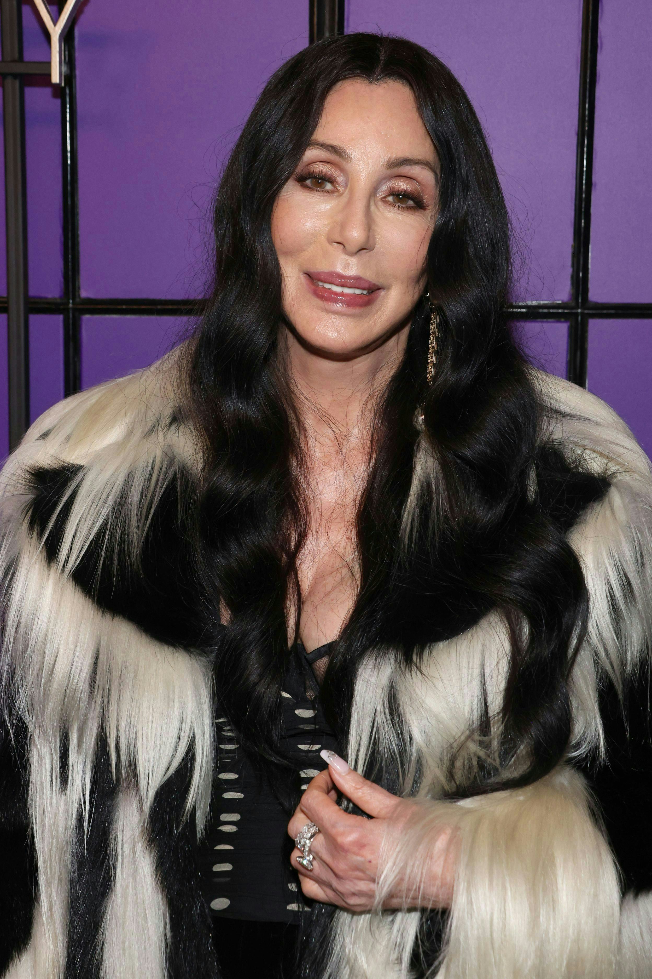 Cher Takes Us Back to 1975 in Bold Fur Coat for NYFW Studio 54 Party