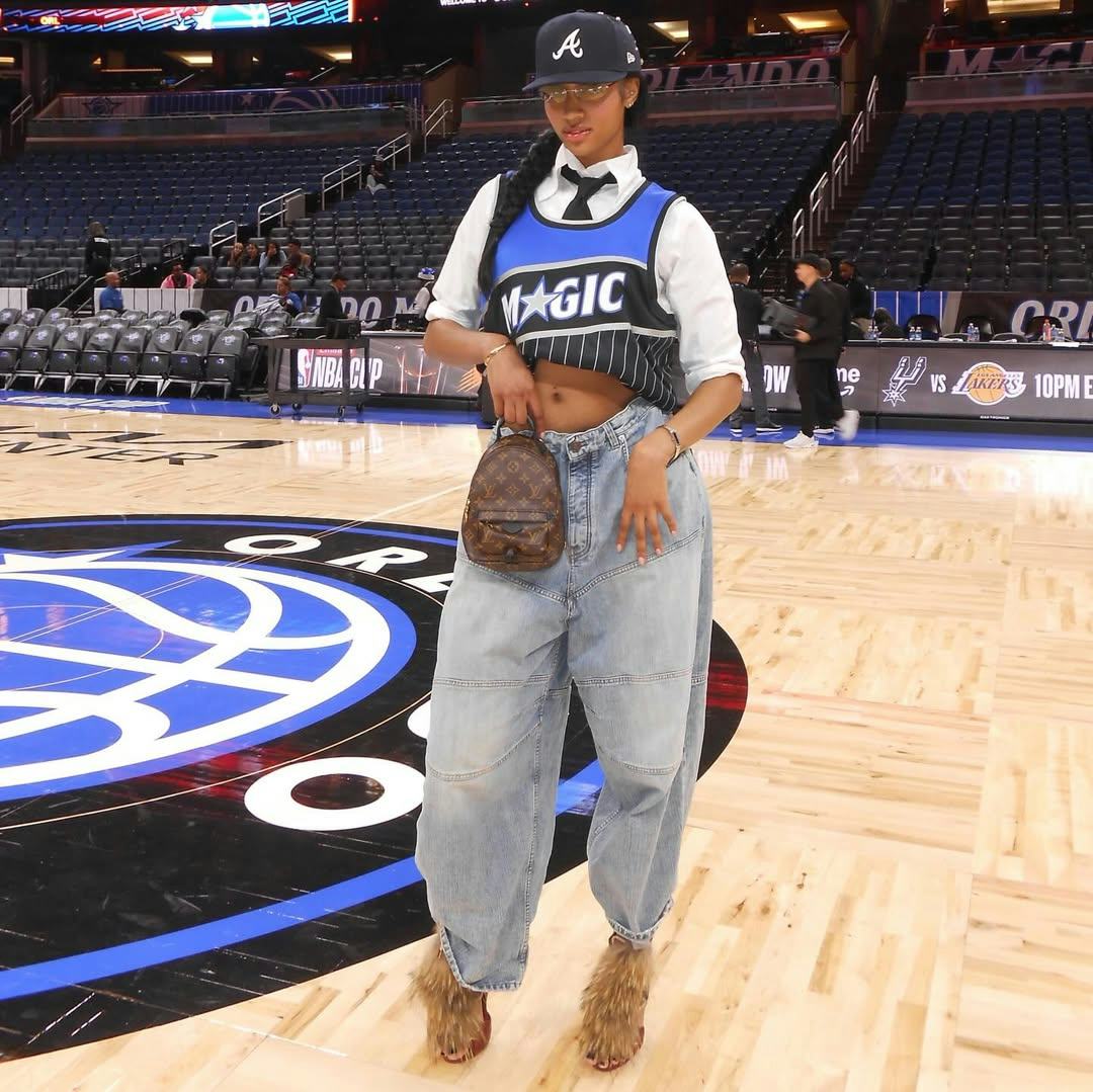 Angel Reese Revived The Nano Bag Trend In A Matching Pajama Set