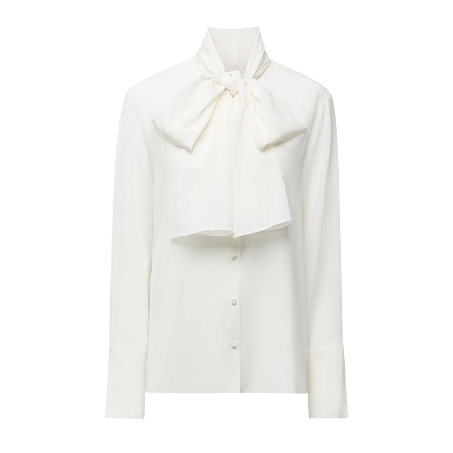 5 Ways to Wear Capes, One of Spring 2026's Biggest Trends