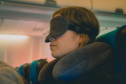 How To Fall Asleep On A Flight — And Stay Asleep — According To Experts
