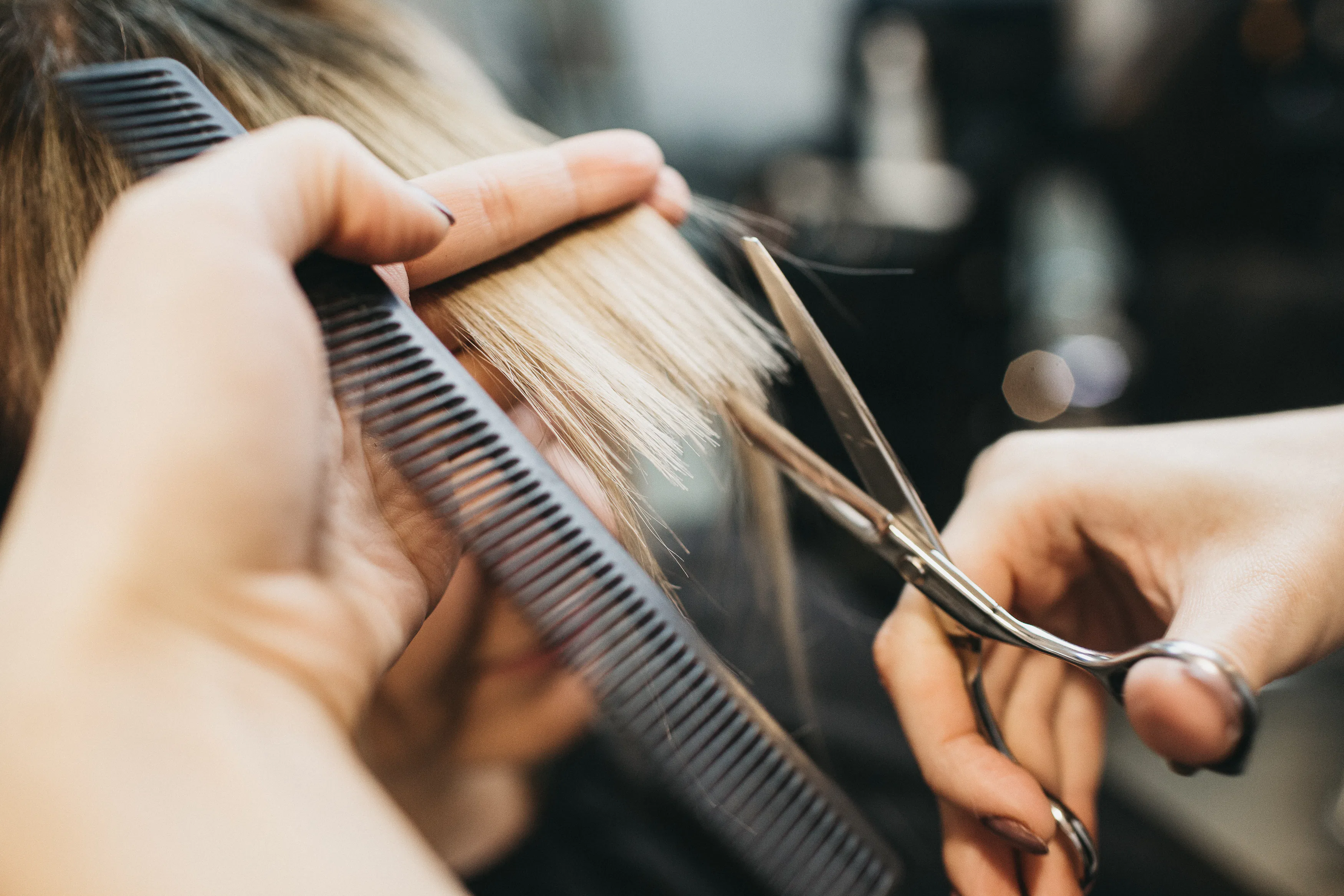 How To Trim Your Own Hair At Home, According To Professional Hairstylists