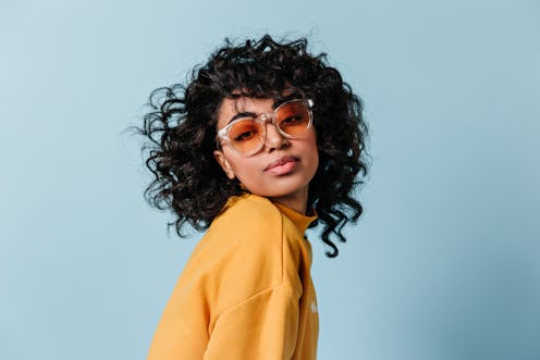 The 11 Best Products For Permed Hair To Keep Your Curls Intact